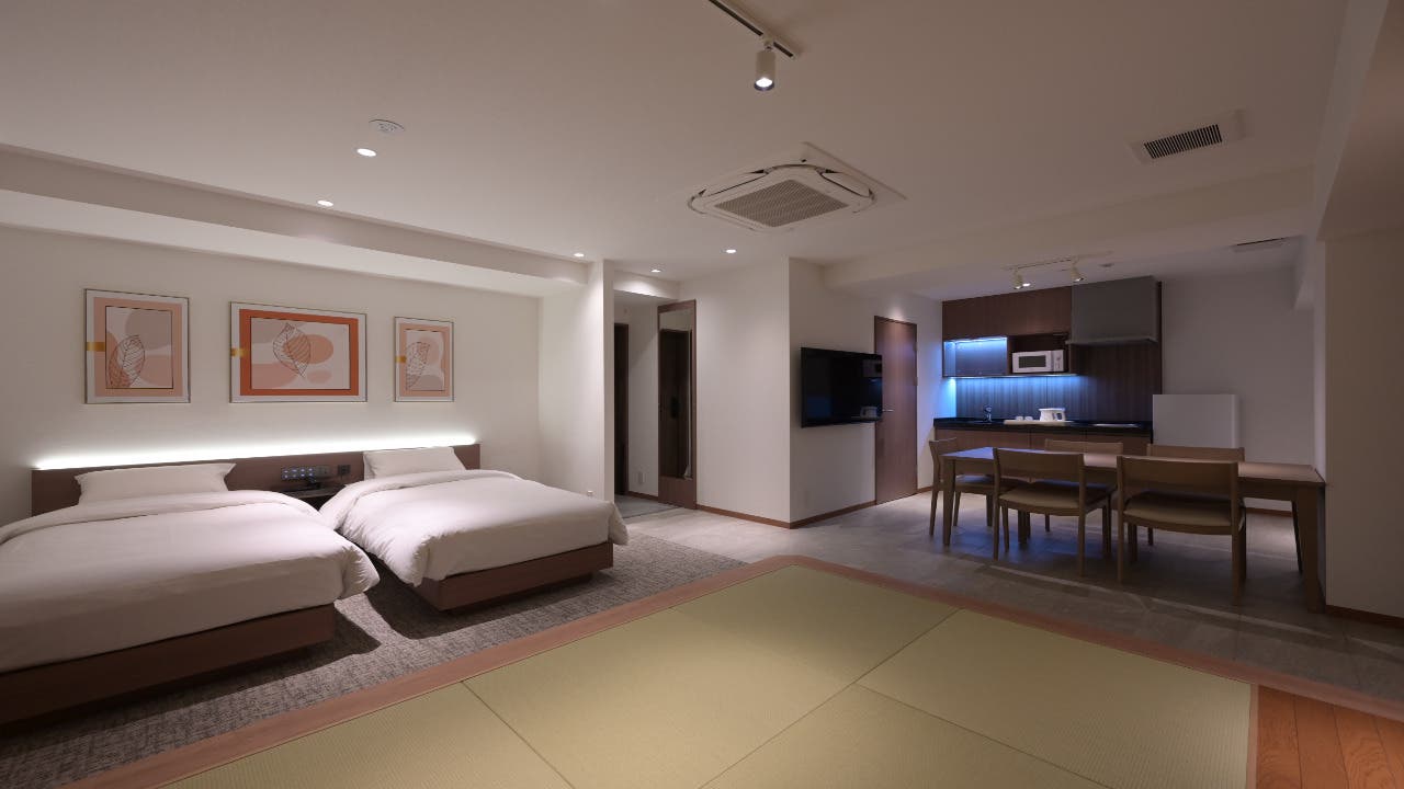 大塚駅徒歩6分｜清掃不要でそのまま使える、スタッフ常駐の広々客室の写真1