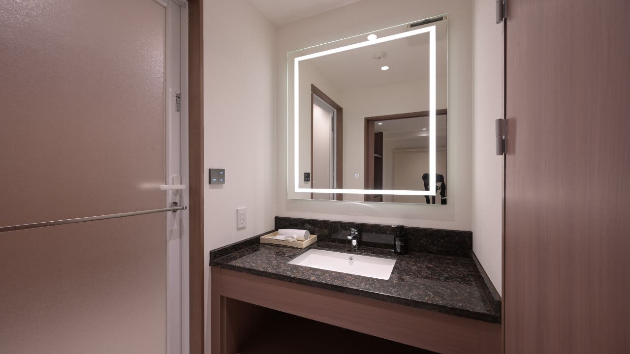 大塚駅徒歩6分｜清掃不要でそのまま使える、スタッフ常駐の広々客室の写真2