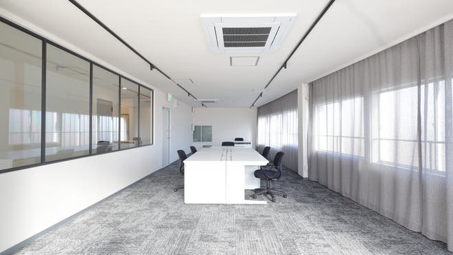 2面採光による自然光がたっぷりと入る、シンプルなOfficeロケ地。の写真6