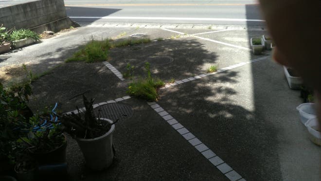 古いブティックの駐車場の写真11