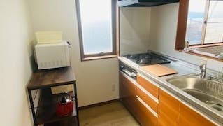 宍道湖が一望できる眺望・最上階広々リビングスペース・80型の大型TV完備の写真2